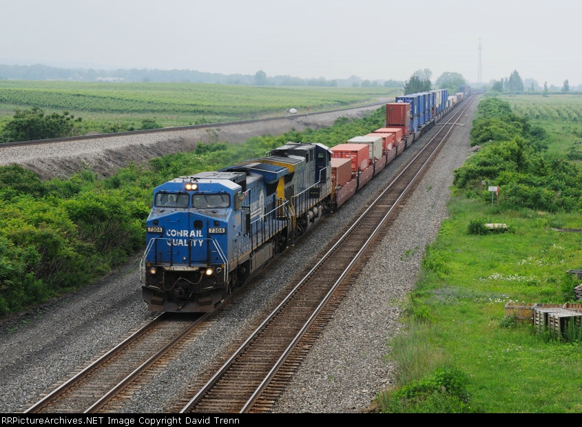 CSX 7304 leads Eastbound CSX Q164 at CP 70 on track number two.